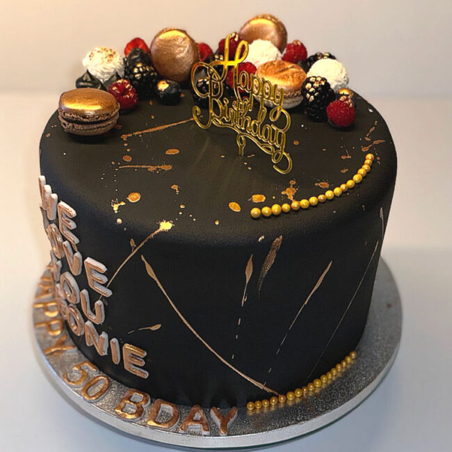 Gold Torte mit schwarzen Fondant - Eva Torten